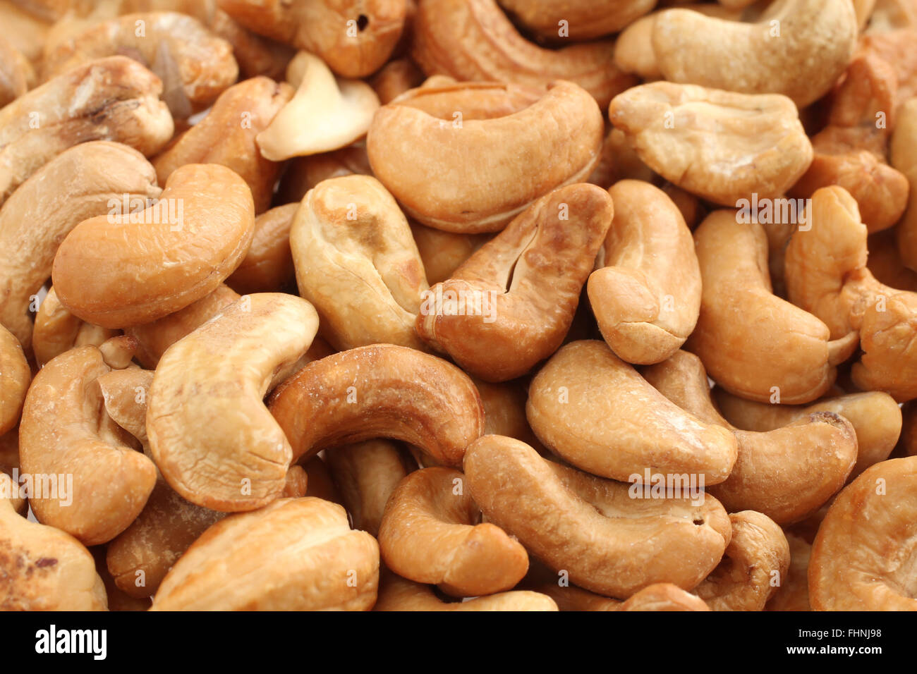 Food background - roasted cashew nuts, top view. Closeup Stock Photo ...