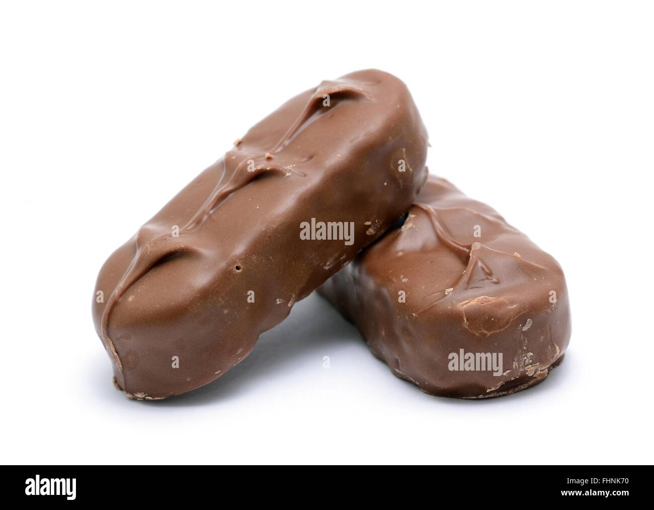 Closeup of the two chocolate bars on a white background Stock Photo - Alamy