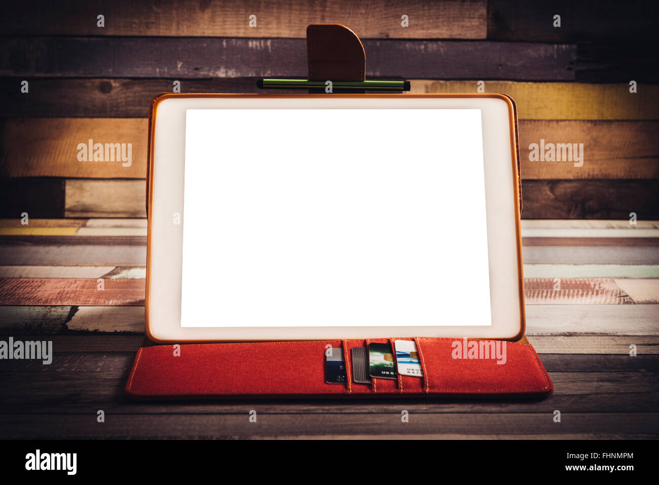 White screen tablet pc on the wooden background Stock Photo - Alamy