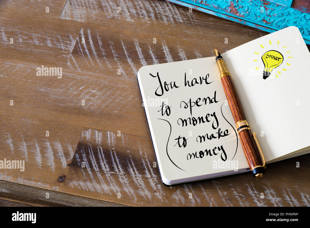 Business concept image with handwritten text YOU HAVE TO SPEND MONEY TO ...