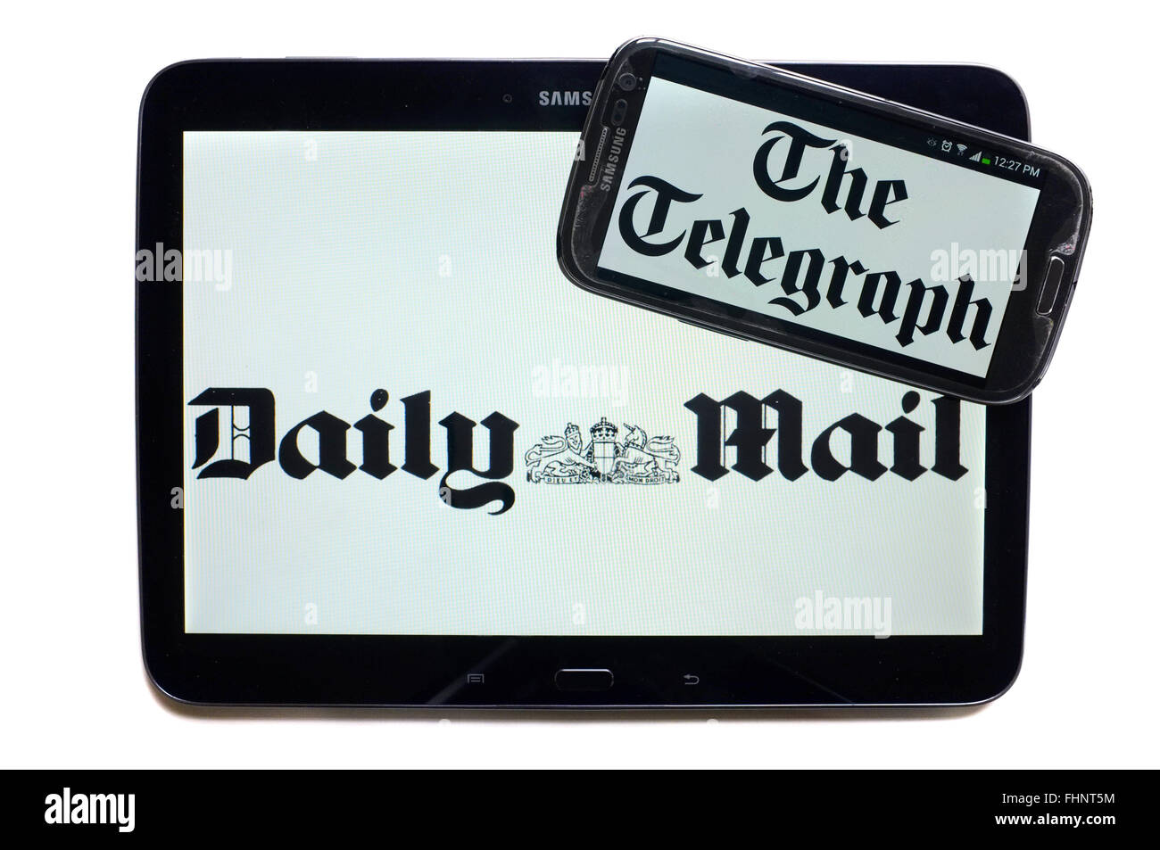 The logos of the Daily Mail and The Telegraph newspapers displayed on ...