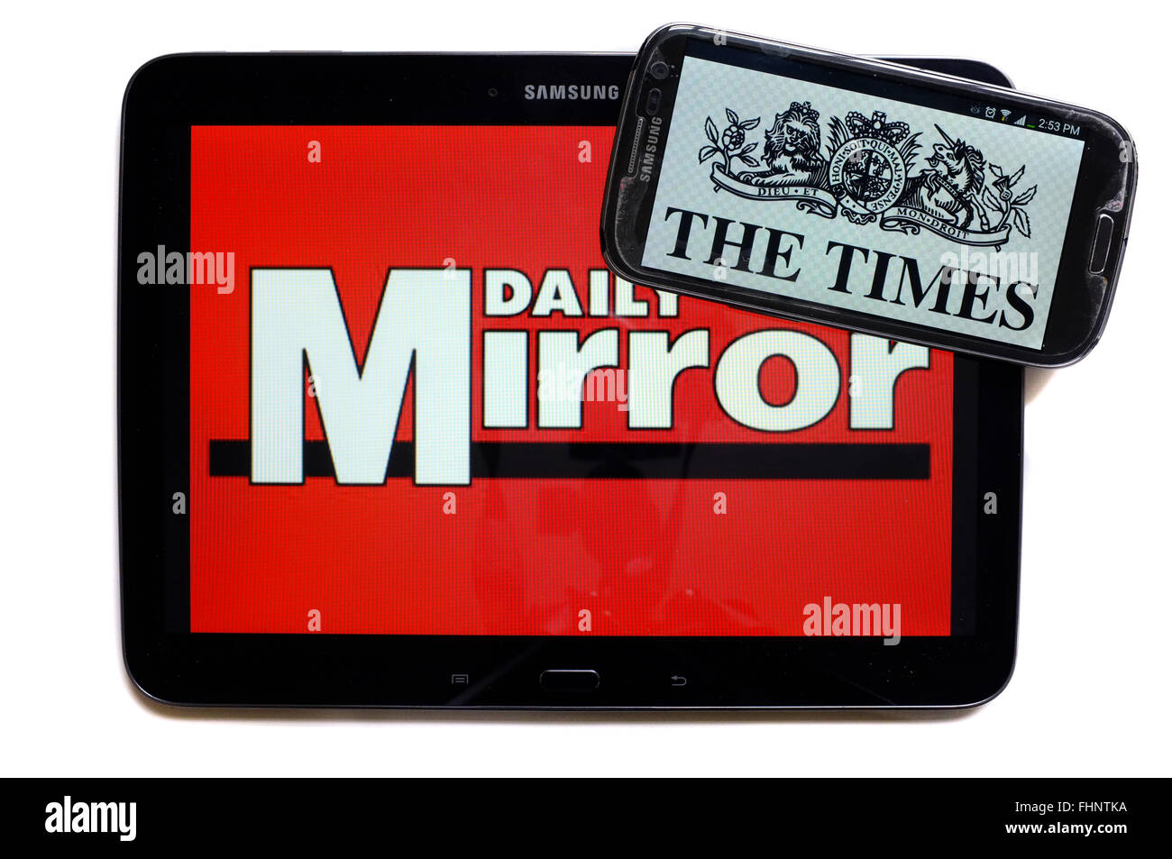 The logos of the Daily Mirror and The Times newspapers displayed on the ...