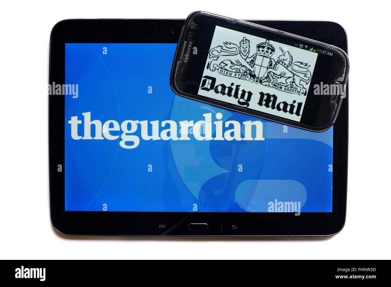 The logos of The Guardian and the Daily Mail newspapers displayed on ...