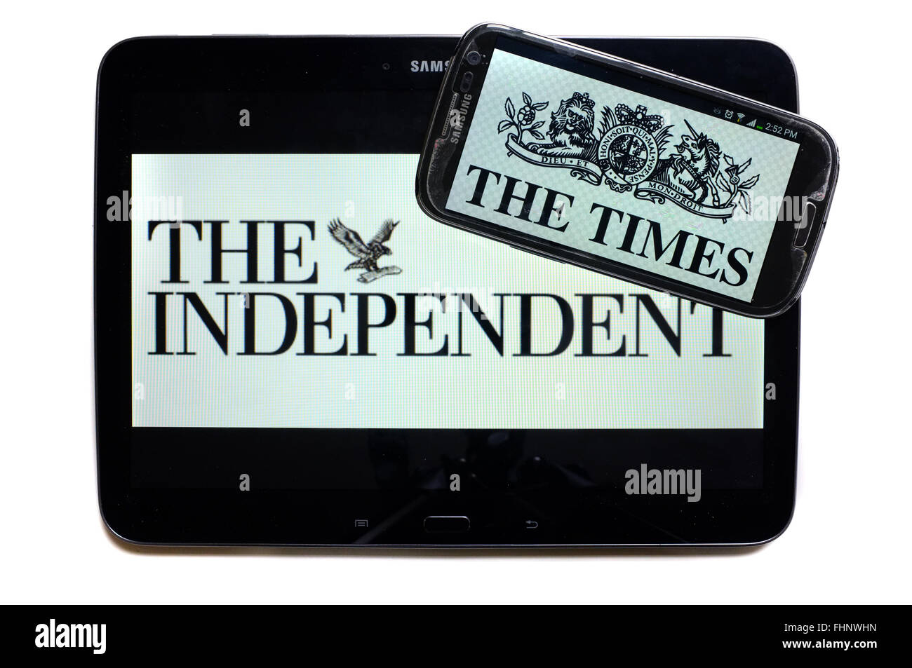 The logos of The Independent and The Times newspapers displayed on the ...