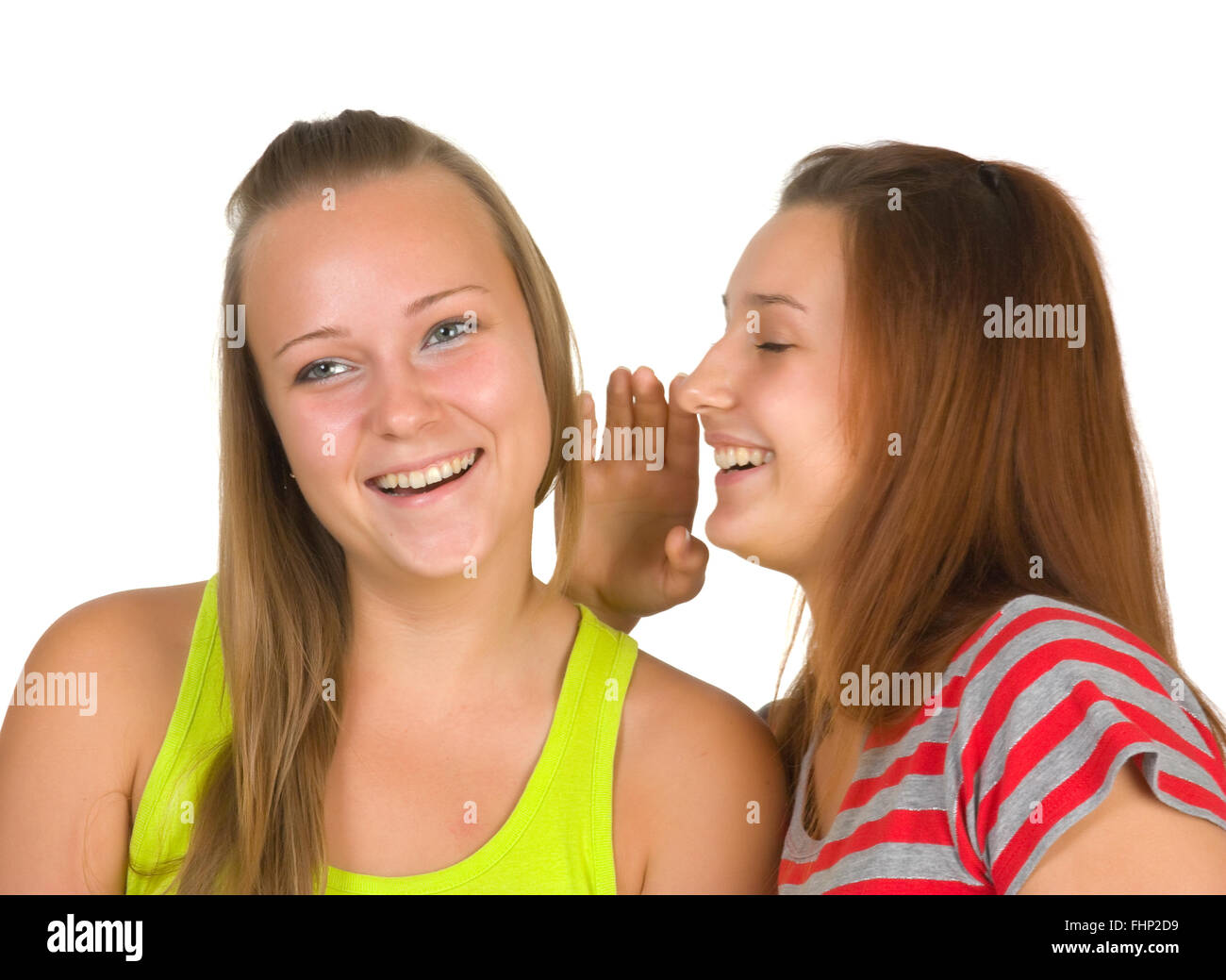 Two teenage girls gossiping Stock Photo - Alamy