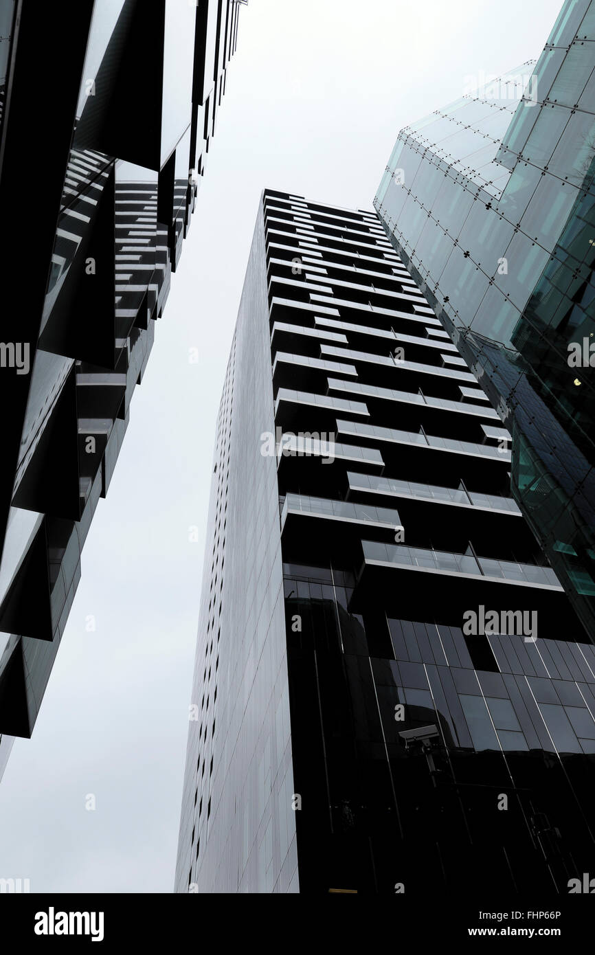Low view of new luxury Heron apartment building on left and Milton Gate ...