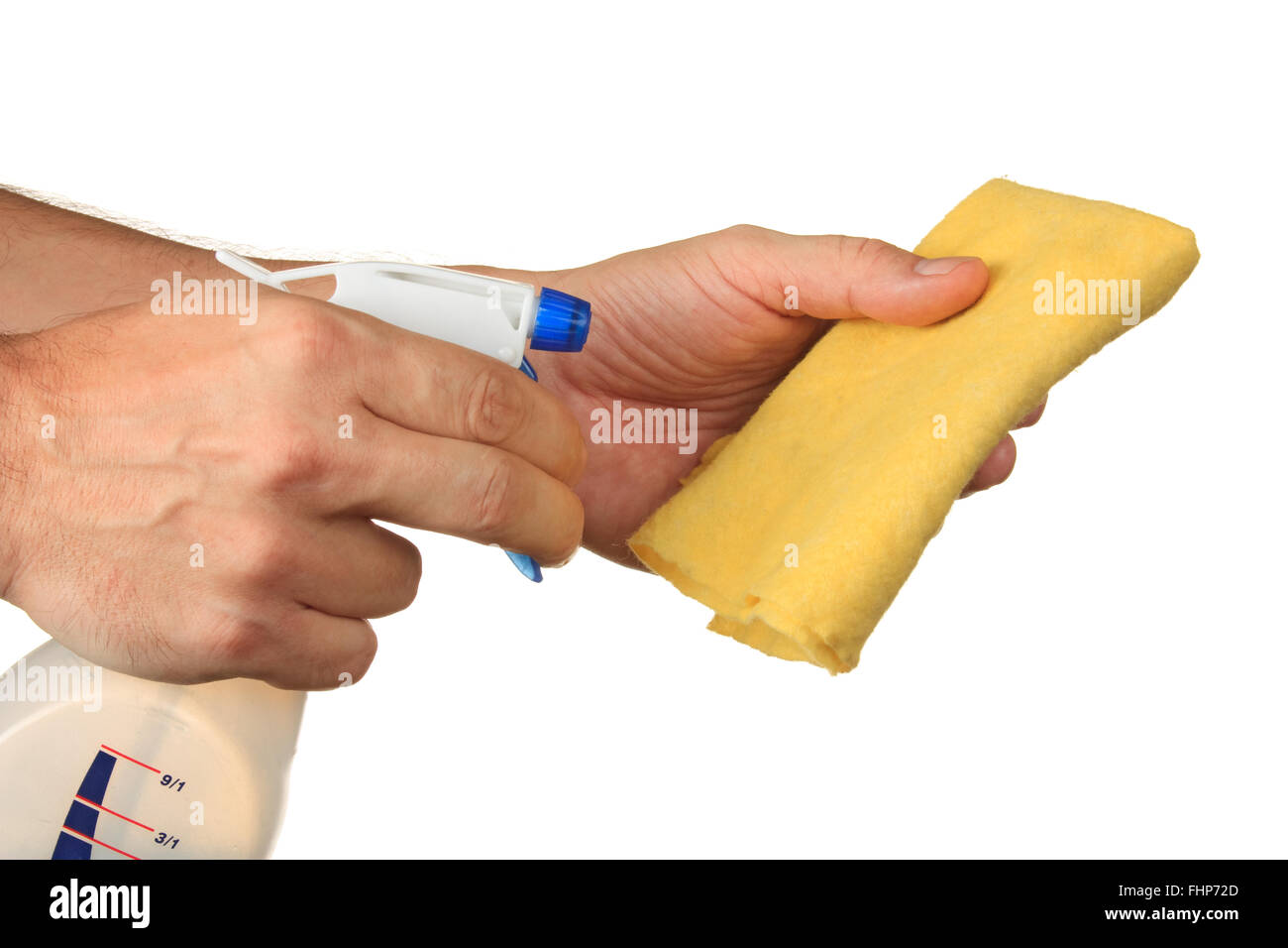 Hand with spray bottle and rag Stock Photo - Alamy