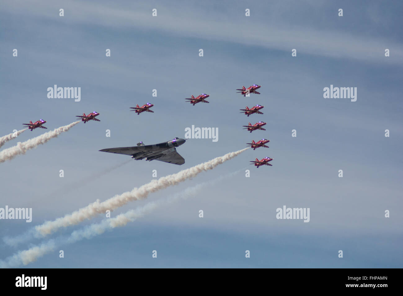 Avro vulcan bomber final farewell flyby with the RAF tred arrows at ...