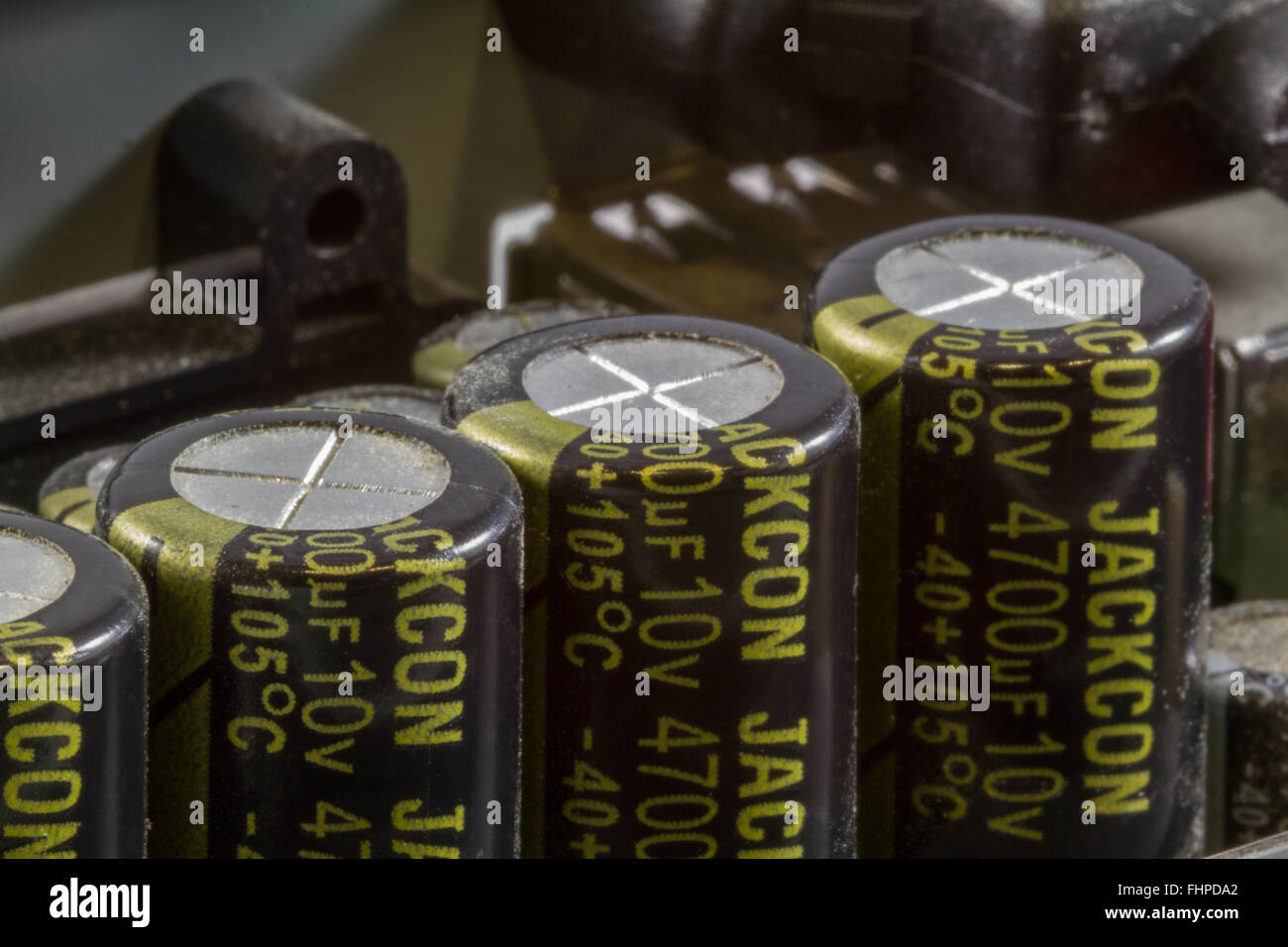 Close up of an array of Electrolytic Capacitors on a Printed Circuit ...