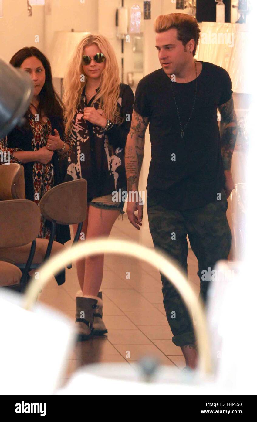Avril Lavigne and Ryan Cabrera shopping together in a lighting shop in ...