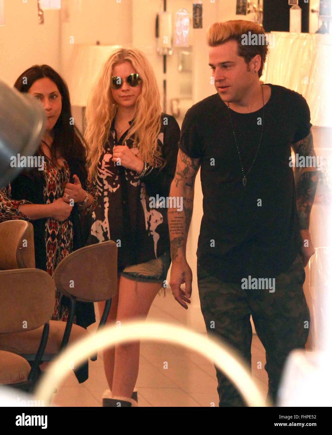 Avril Lavigne and Ryan Cabrera shopping together in a lighting shop in ...