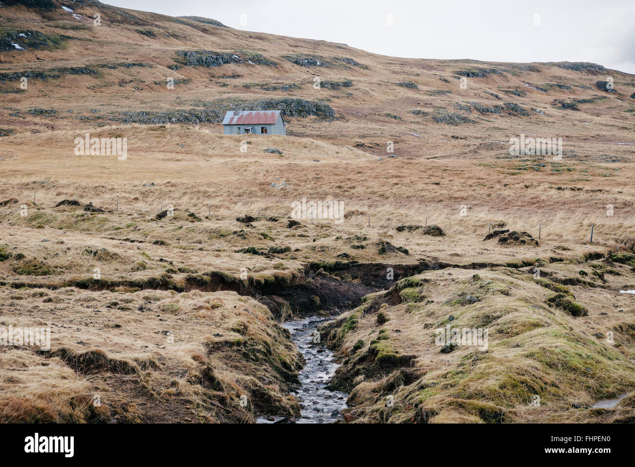A corrugated iron house in a baron landscape in Iceland Stock Photo - Alamy