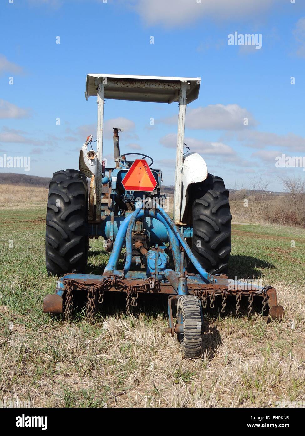 Tractor in field Stock Photo - Alamy