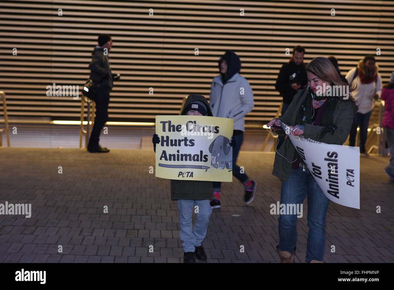 New York City, United States. 25th Feb, 2016. Mother and son with ...