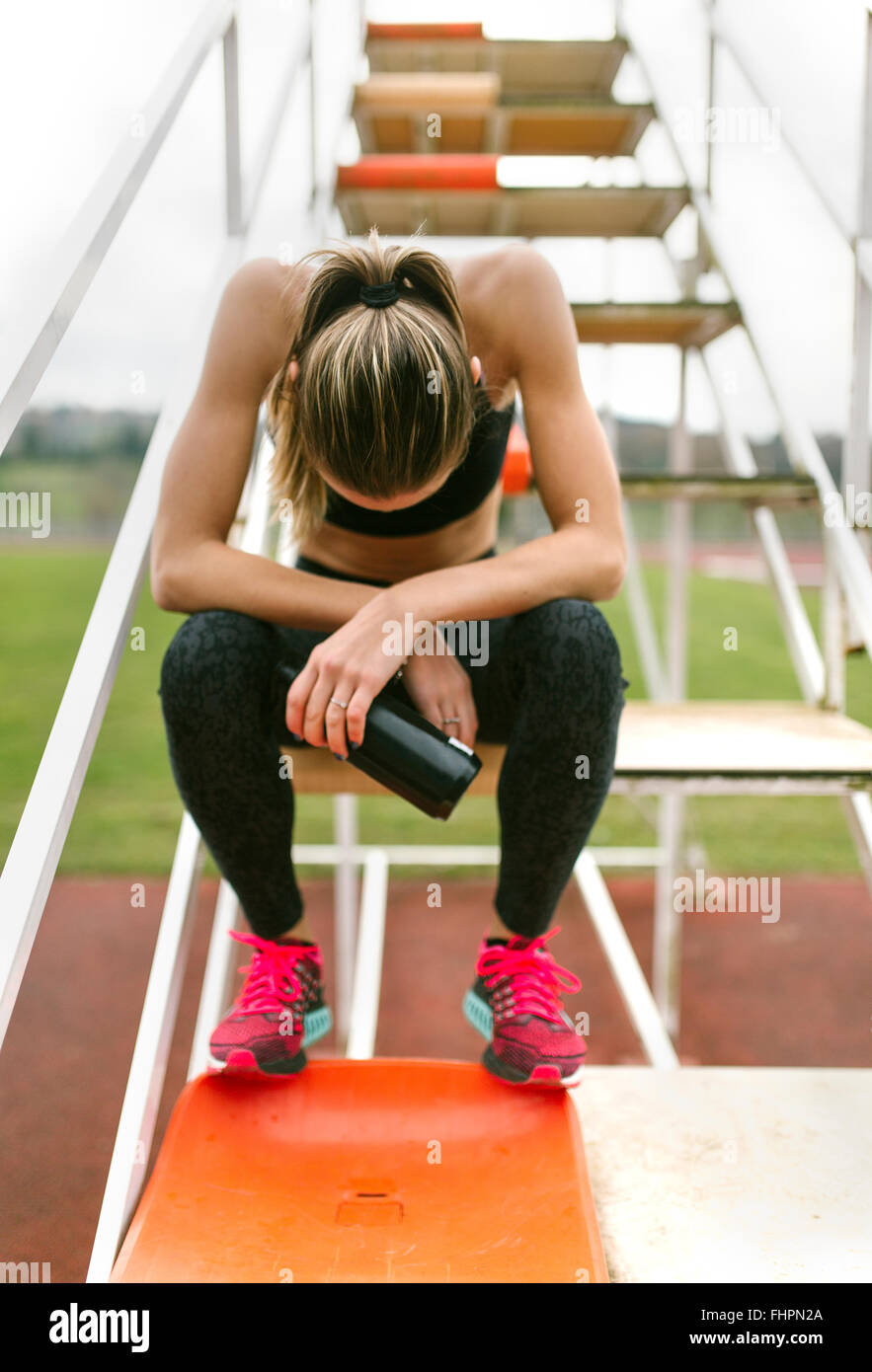 Athlete woman recovering after training hi-res stock photography and ...