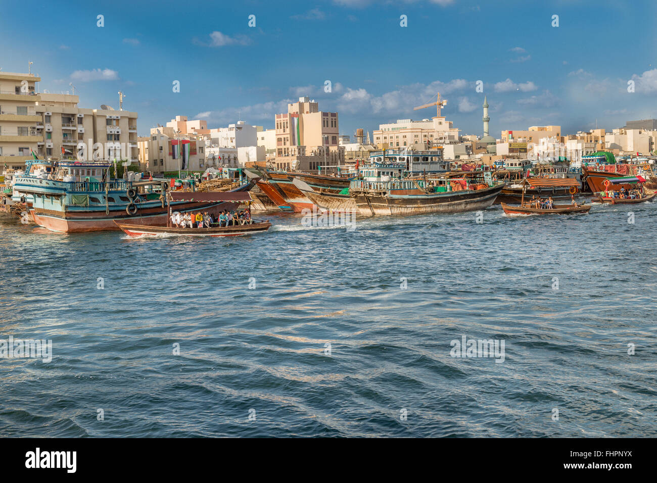 Traditional abra ferry crossing dubai hi-res stock photography and ...