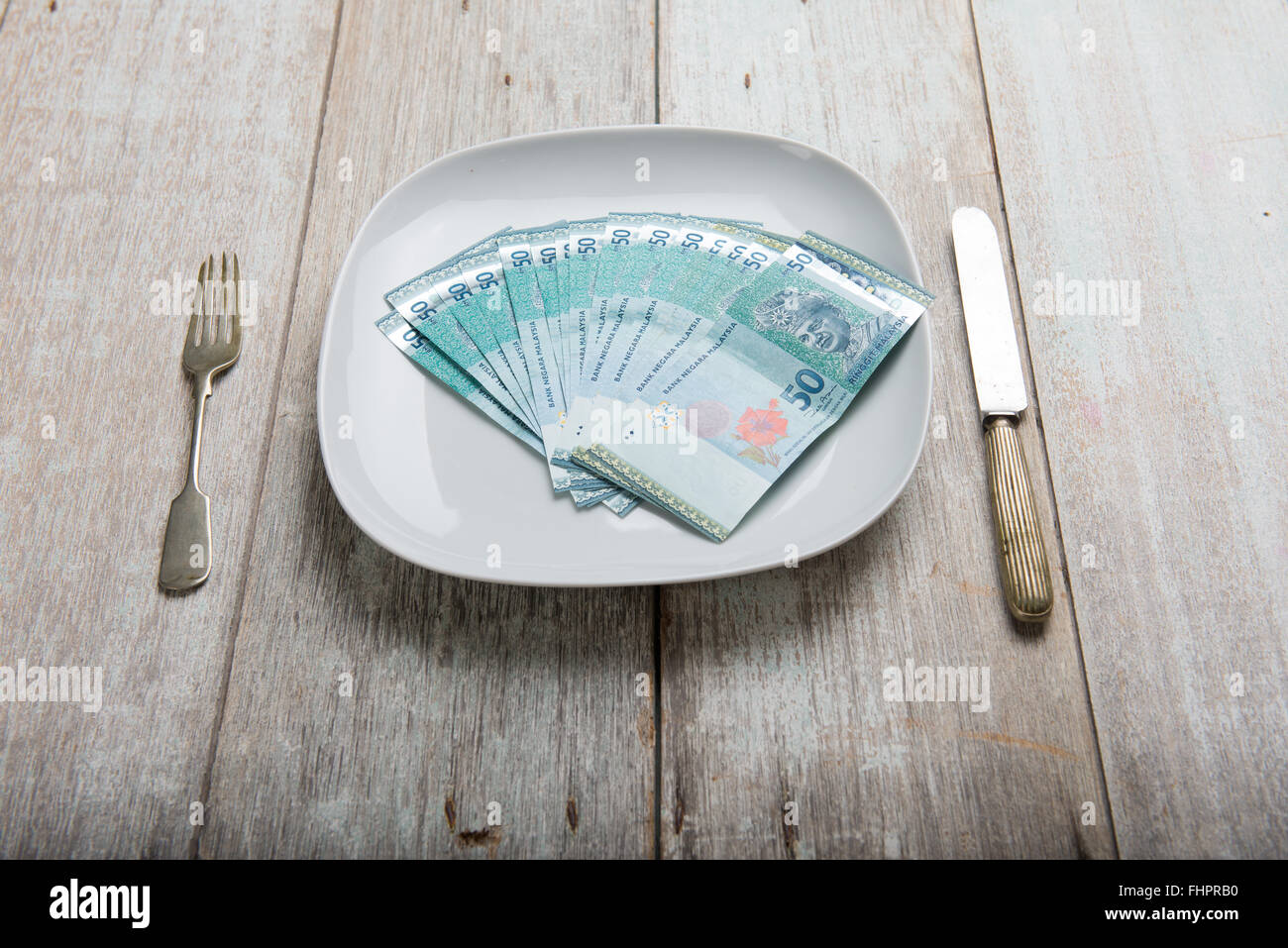 Greedy plate hi-res stock photography and images - Alamy