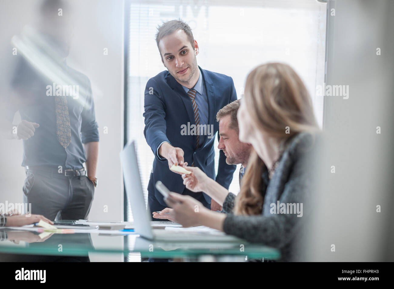 Handing a note hi-res stock photography and images - Alamy