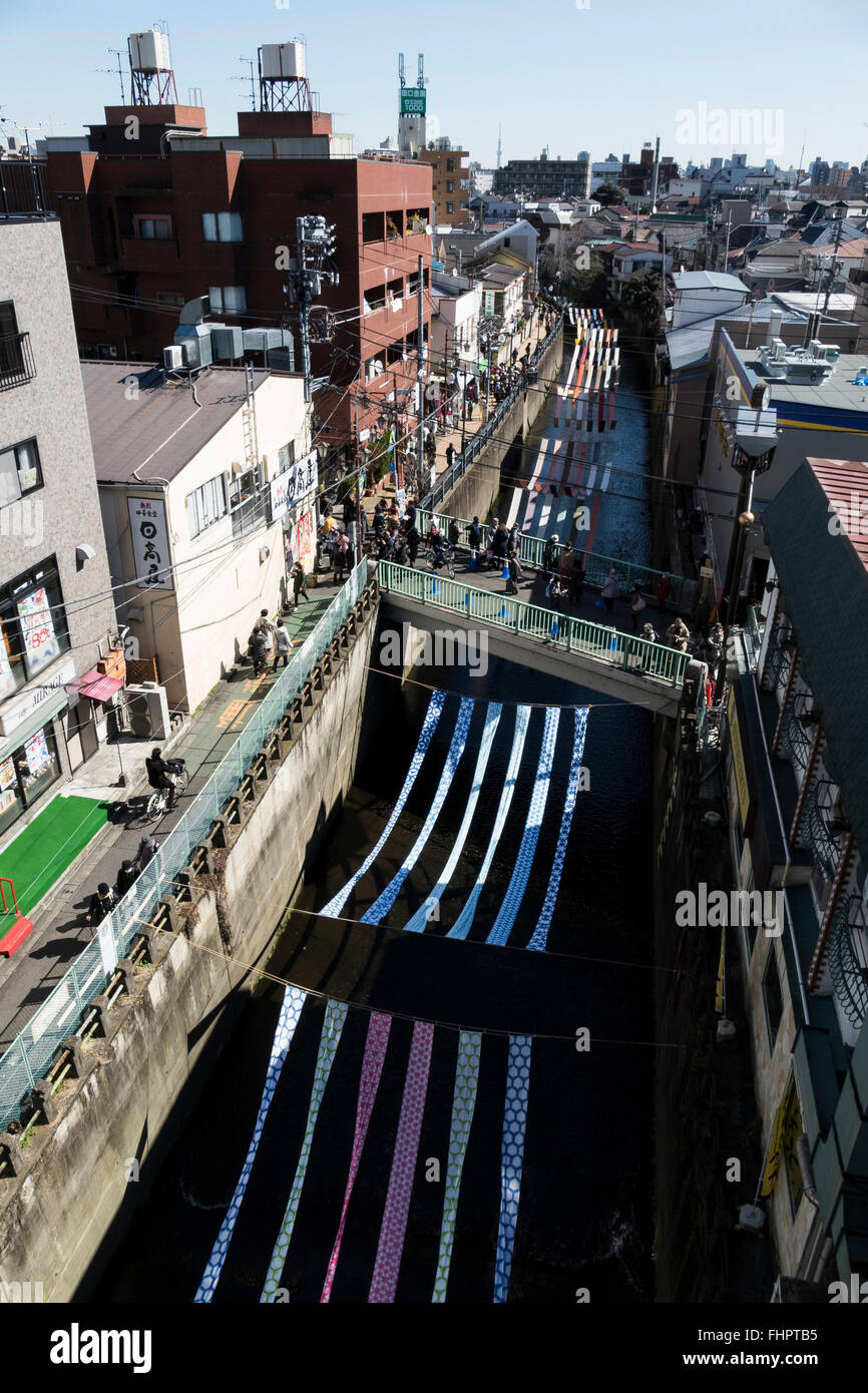 Shinjuku ward, Tokyo, Japan. 26th February, 2016. Long pieces of fabric ...