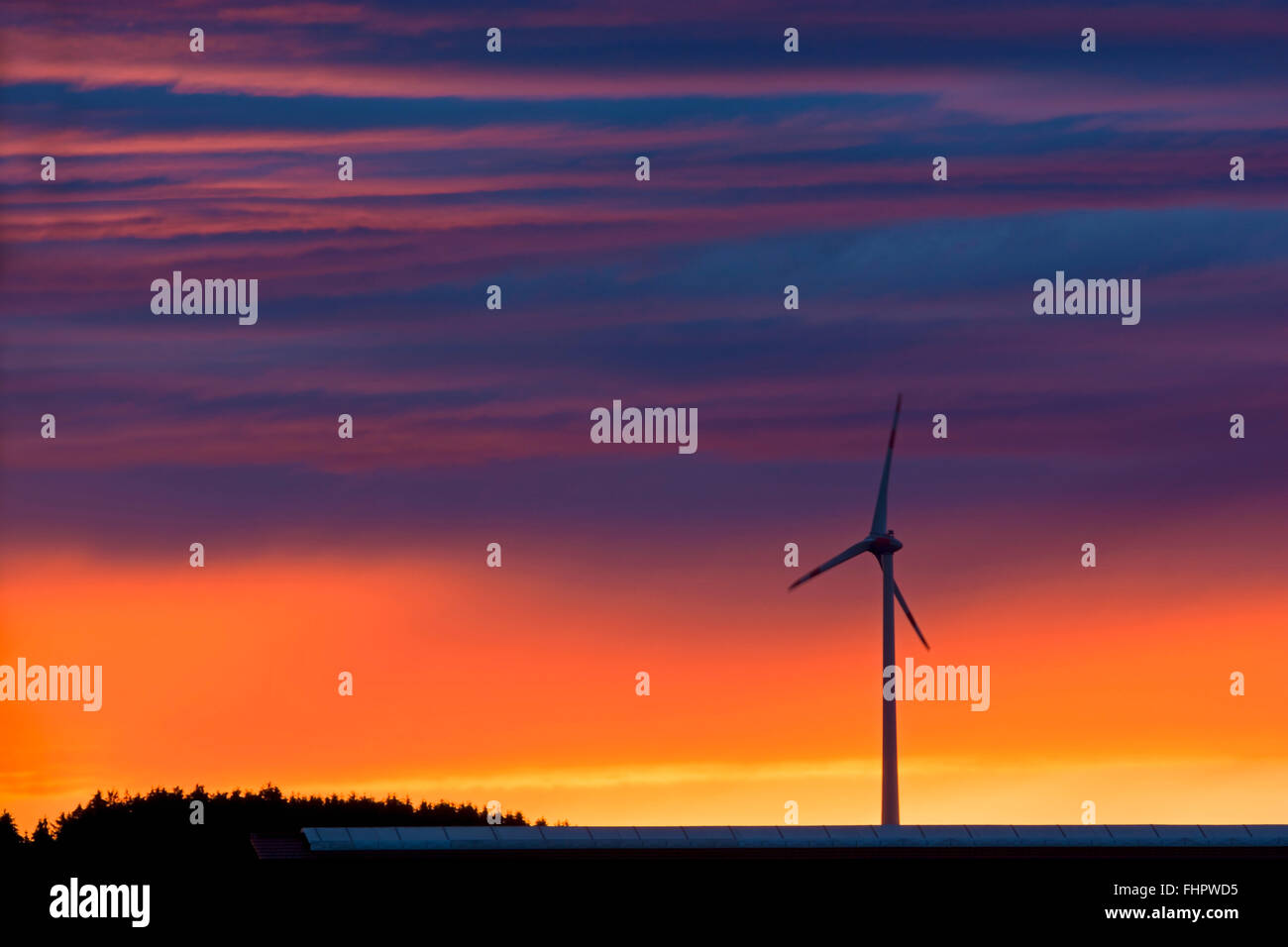 Wind wheel and evening sky Stock Photo - Alamy