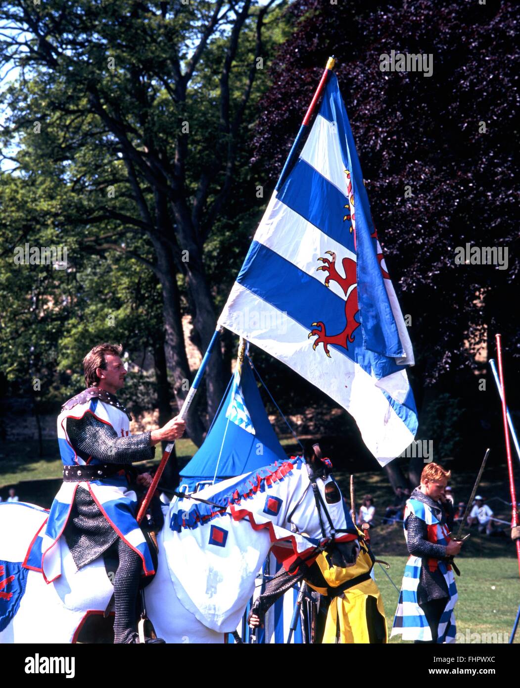 Victorious Knight holding a flag during the Jousting Tournament in ...