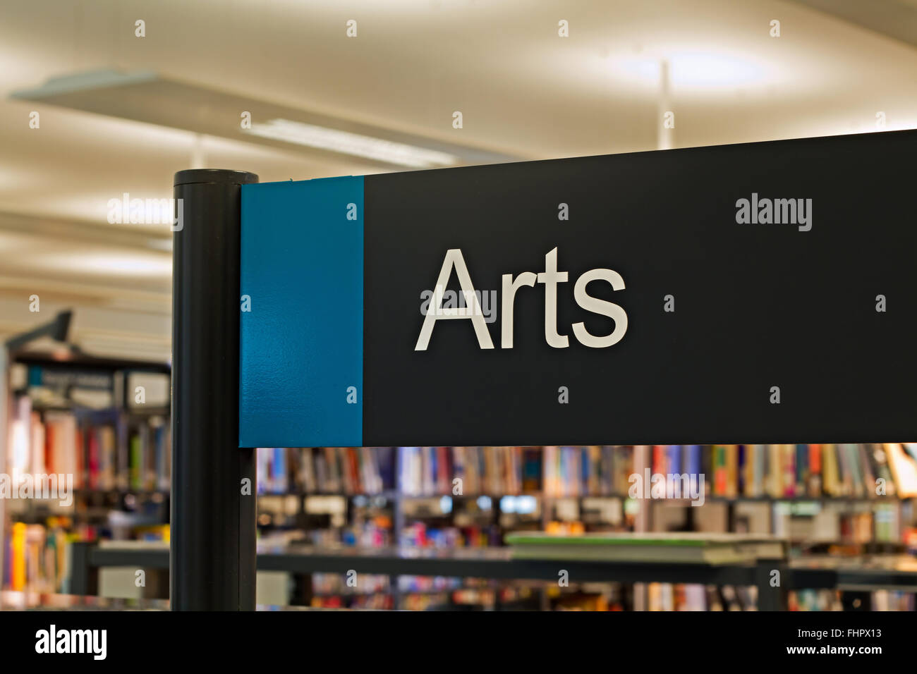 Art section sign inside a modern public library Stock Photo - Alamy