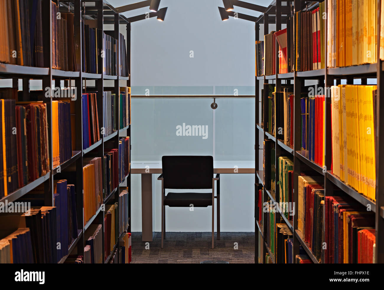 Shelves full of books in a modern library Stock Photo - Alamy