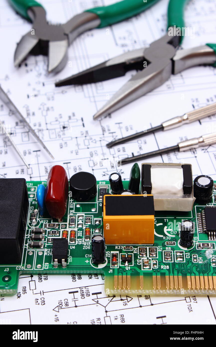 Printed circuit board with electrical components and precision tools ...