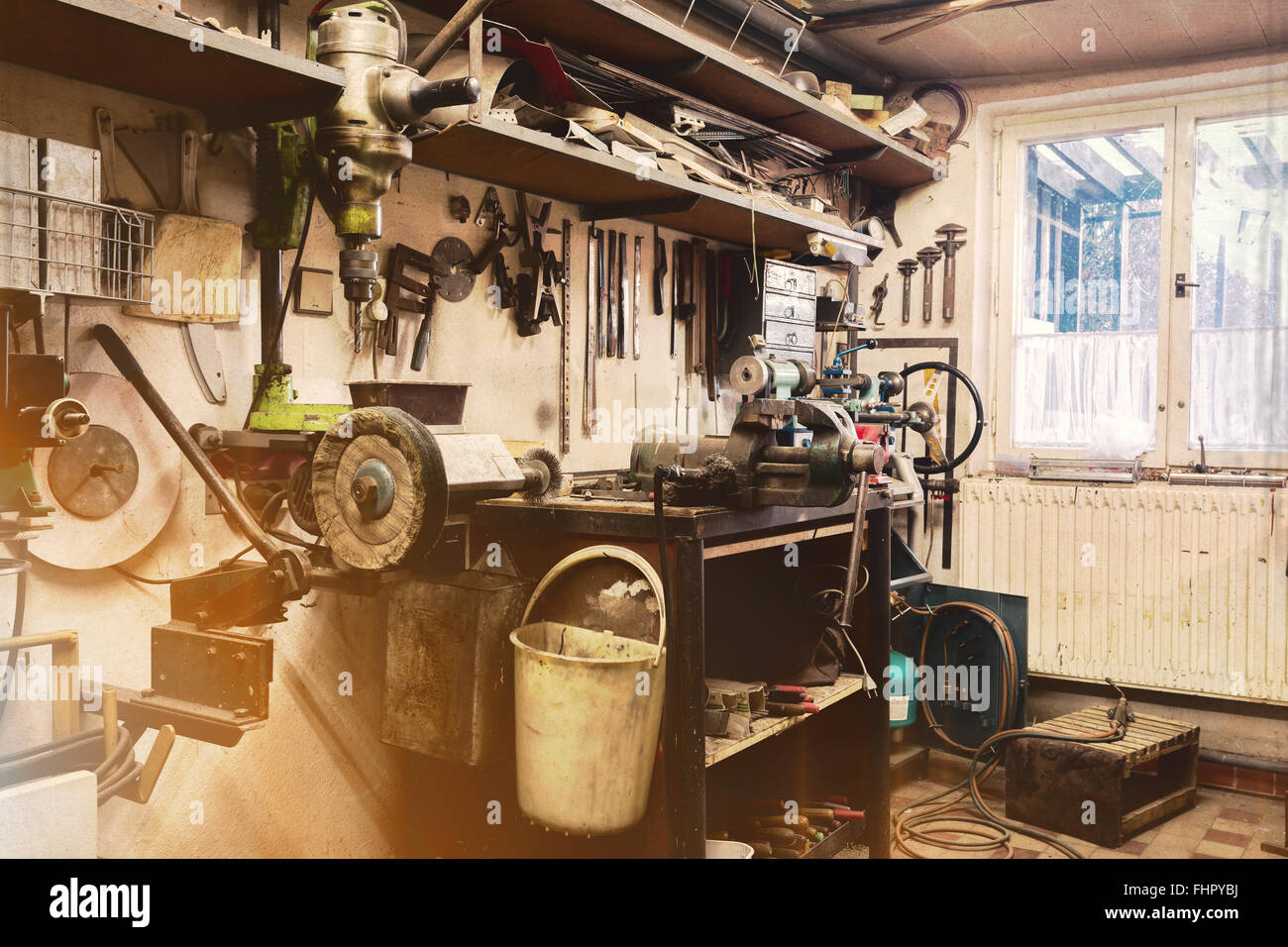 real domestic DIY home workshop full of tools, untidy, ready for work ...