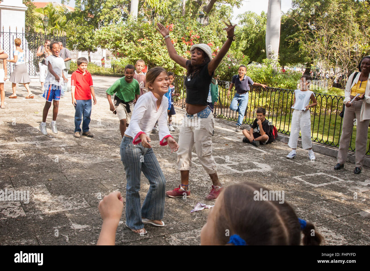 A group of children having fun playing games in Havana, Cuba Stock ...