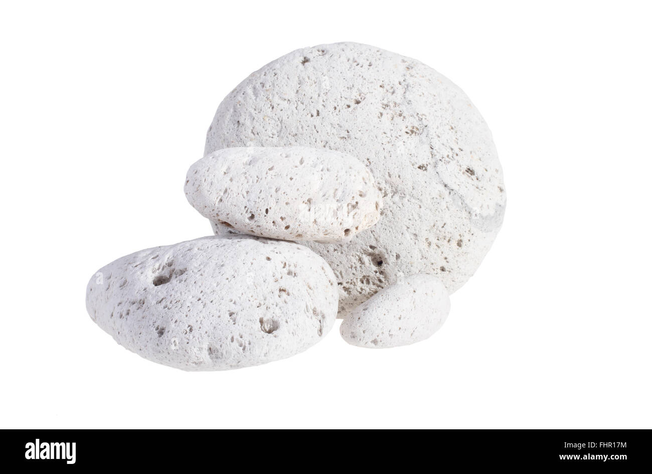 Pile of four pumice stones isolated on white background Stock Photo - Alamy