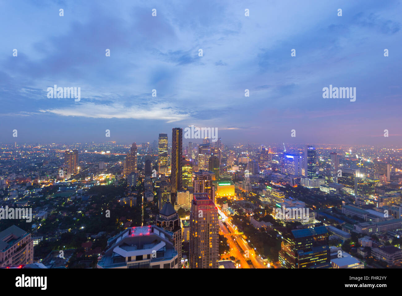 Aerial view of the Bangkok's skyline at dusk, Thailand. Glowing ...