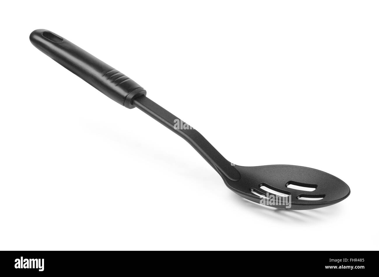 Plastic spoon holes kitchen Cut Out Stock Images & Pictures - Alamy