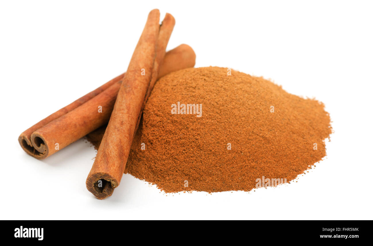 Cinnamon sticks and powder isolated on white background Stock Photo - Alamy