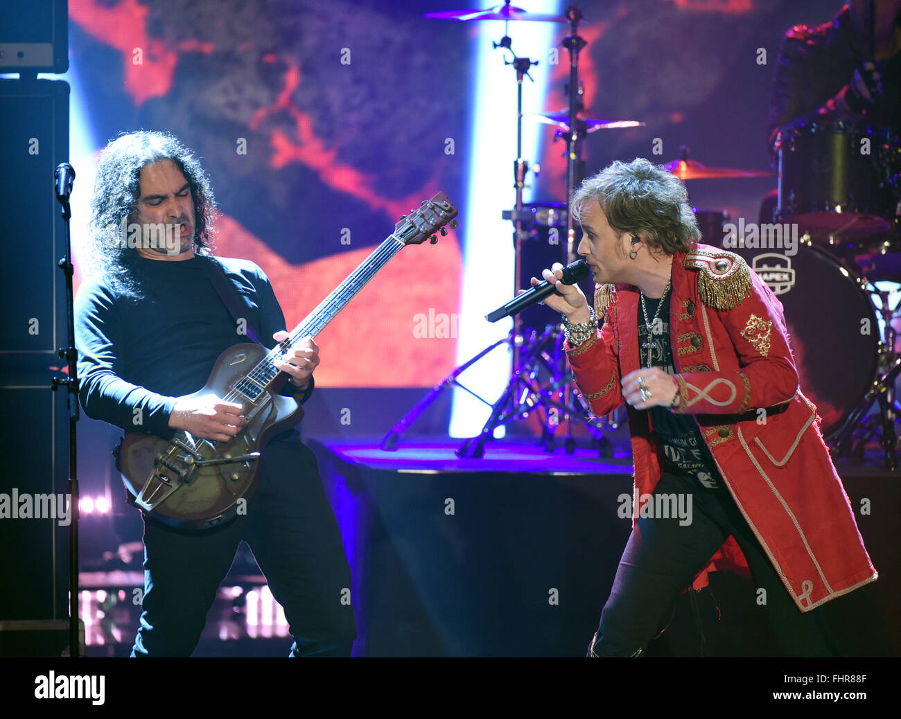 Cologne, Germany. 25th Feb, 2016. Singer Tobias Sammet (R) of music ...