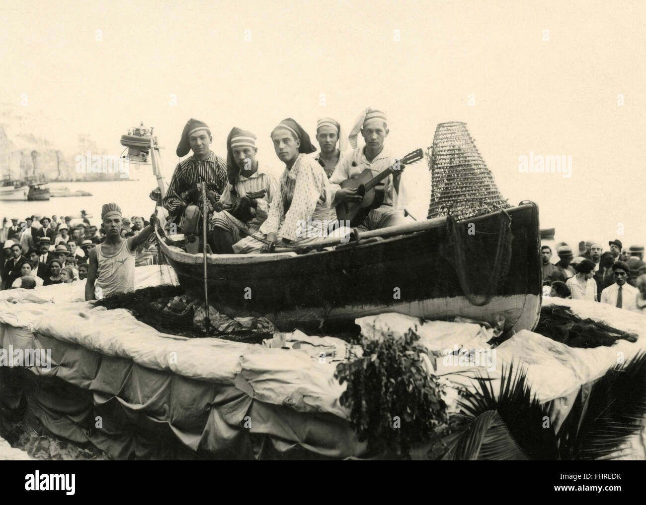 Representation of men in a boat with guitar, Naples, Italy Stock Photo ...
