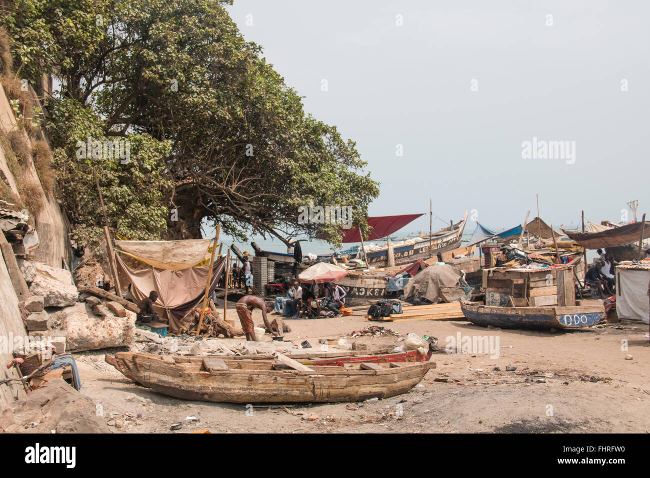 ACCRA, GHANA - JANUARY 2016: Fishing boats on the shore of Jamestown ...