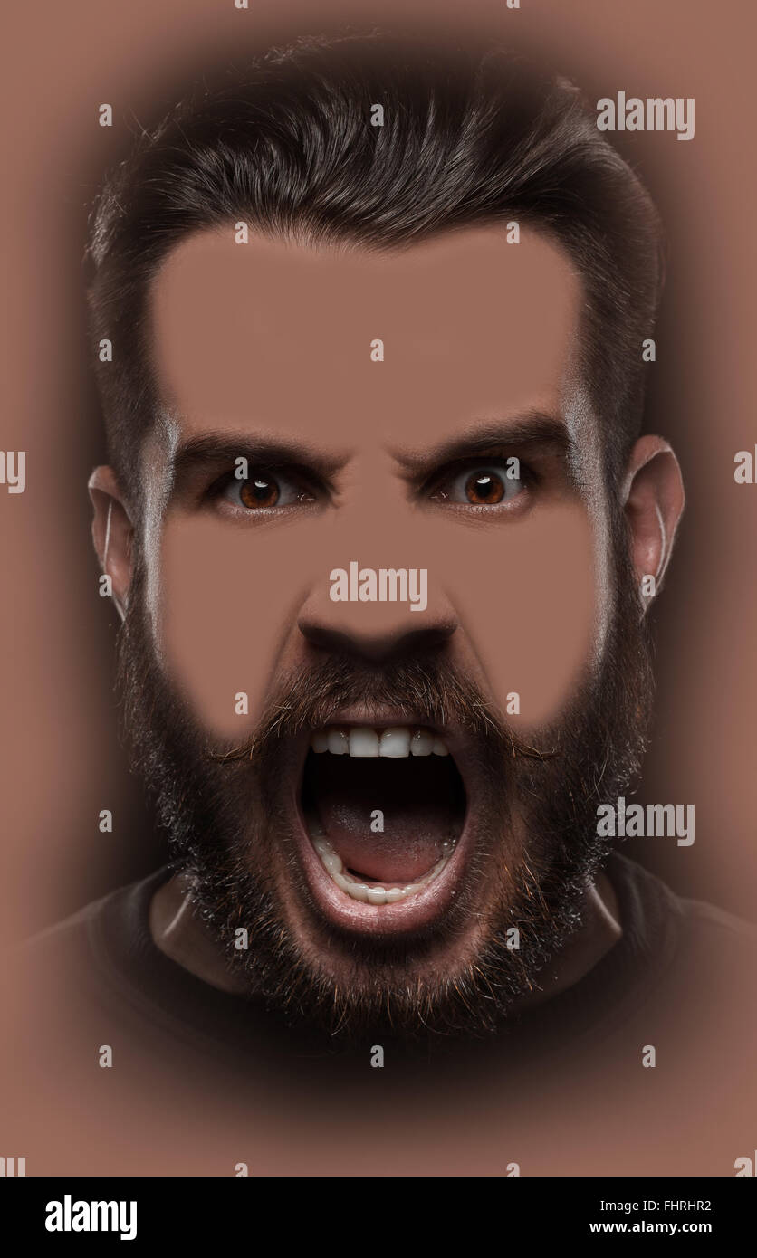 Portrait of young frightened crying man with a beard and mustache on ...