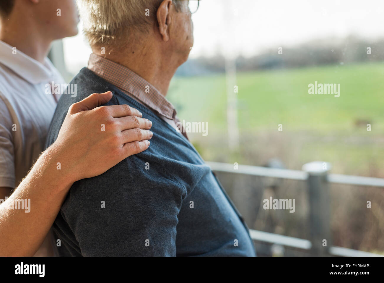 Hand on a shoulder hi-res stock photography and images - Alamy