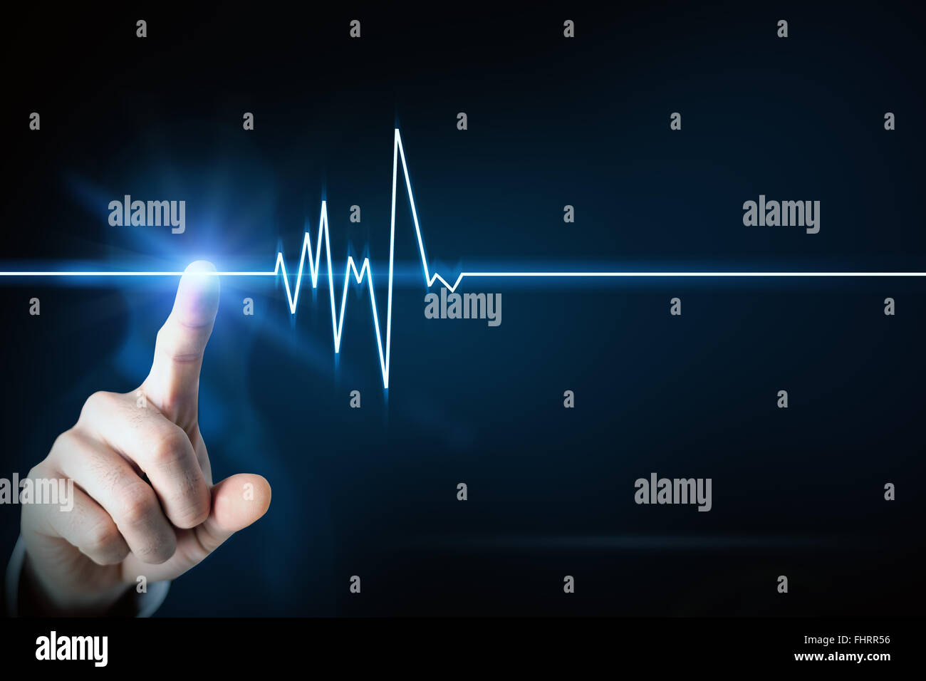 Businessman touching line of heartbeating Stock Photo - Alamy