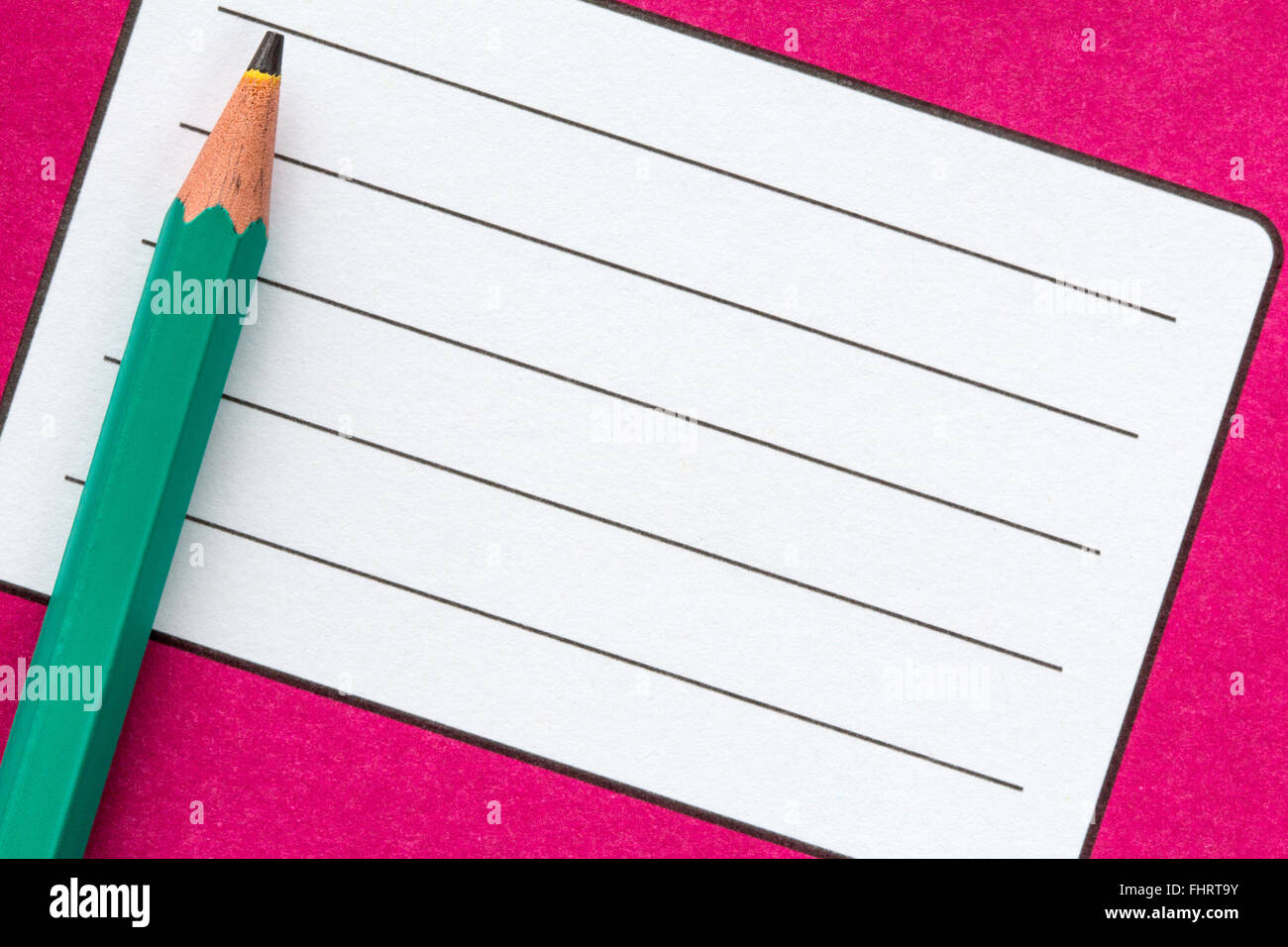Close up of school exercise book, with name label and pencil Stock ...