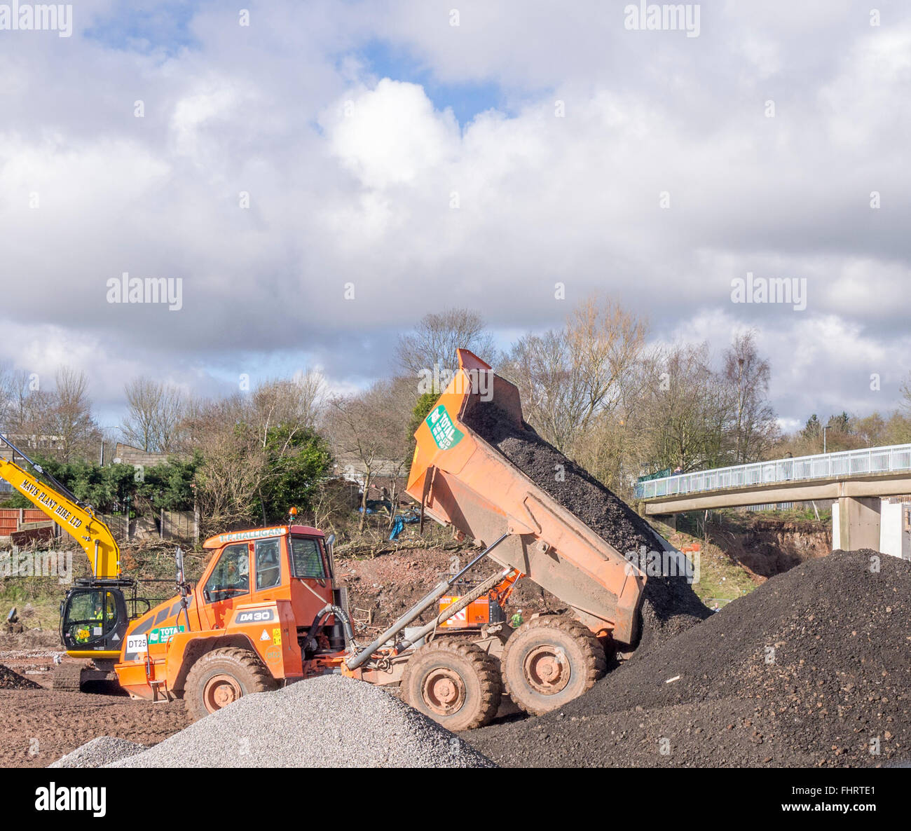 Dump truck tipping its load of rubble Stock Photo - Alamy