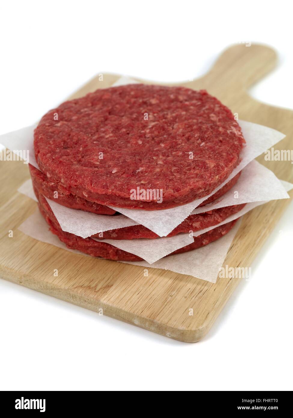 raw hamburger patties on a kitchen bench Stock Photo - Alamy