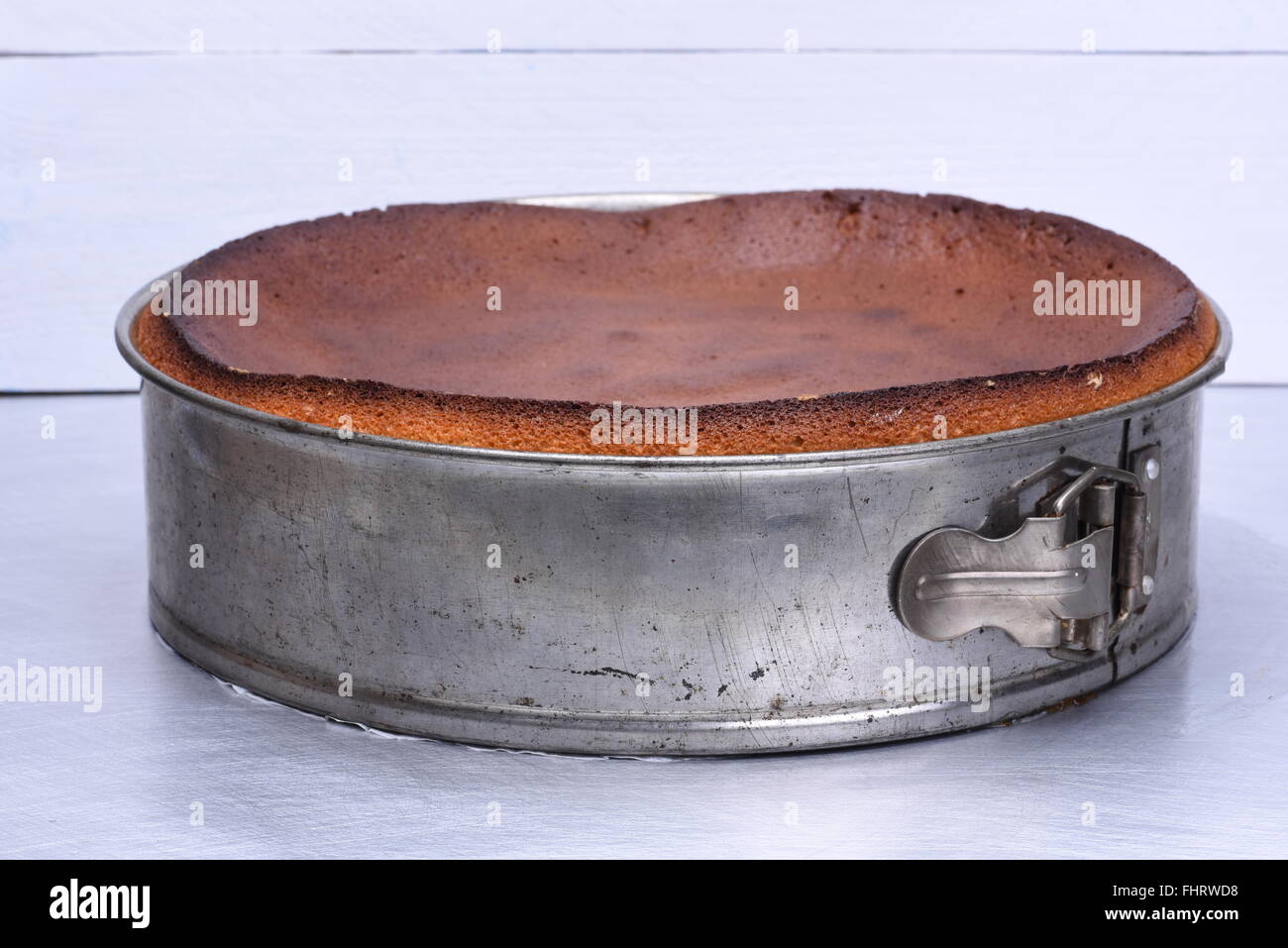 Cake in metal springform in the kitchen Stock Photo - Alamy