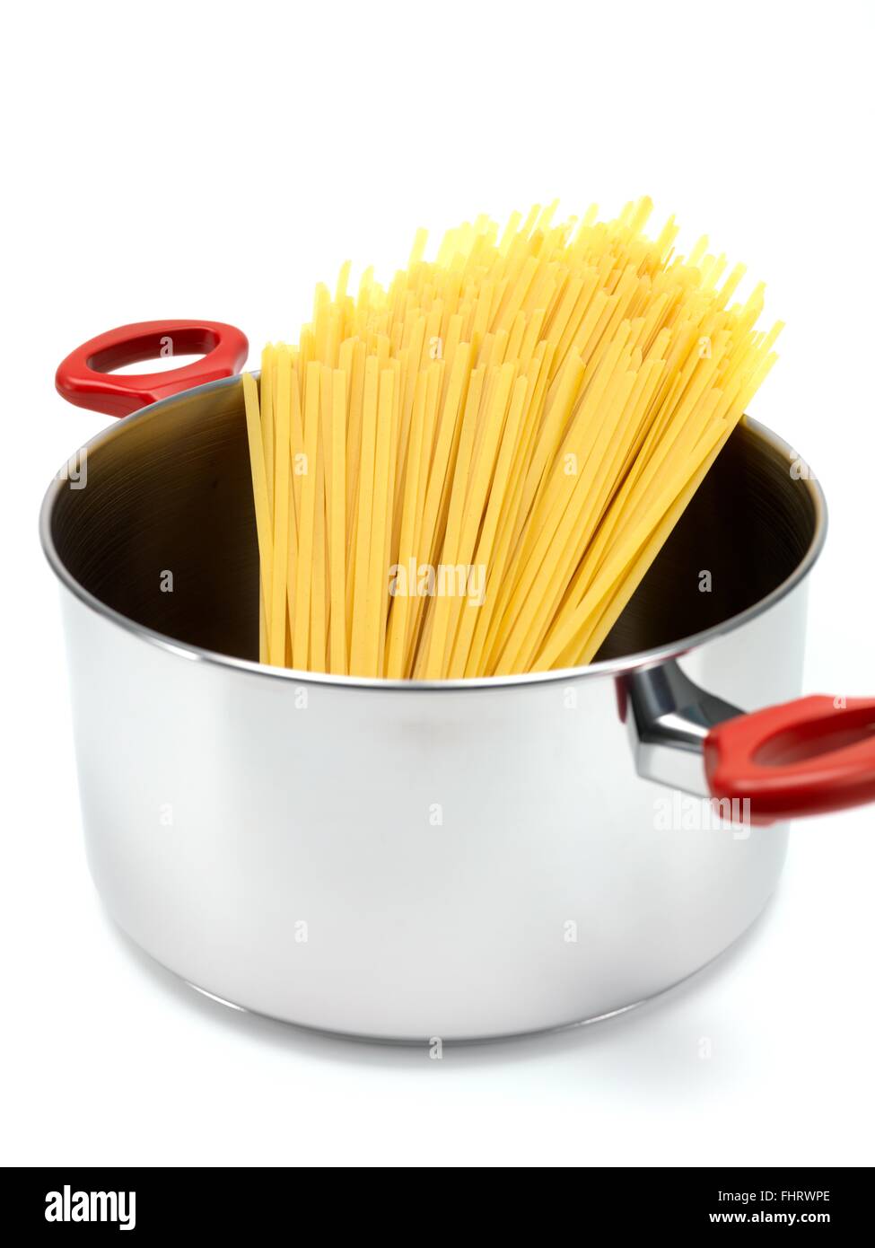 Pasta in a cooking pot ready for cooking Stock Photo - Alamy