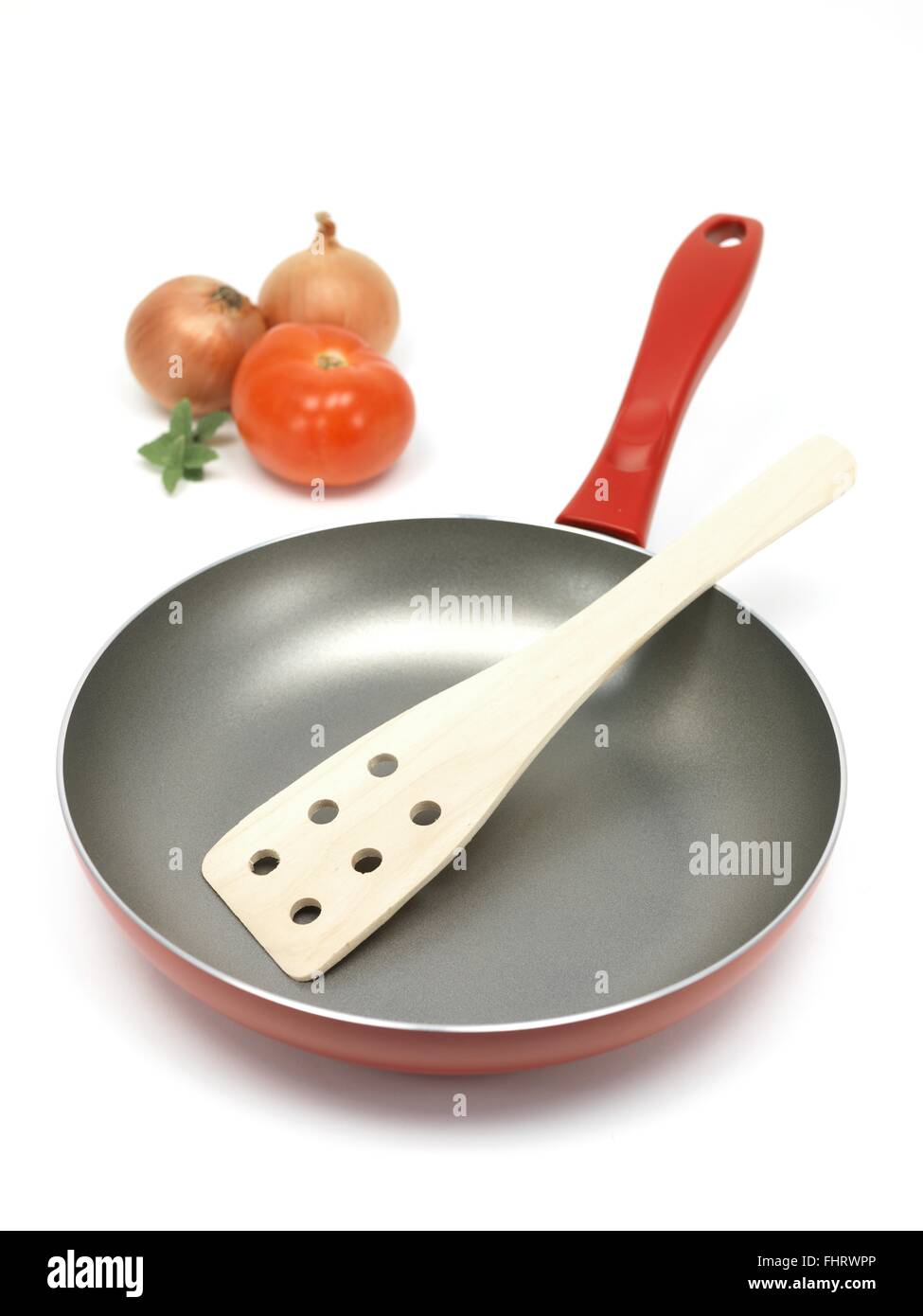 A frying pan on a kitchen bench Stock Photo - Alamy
