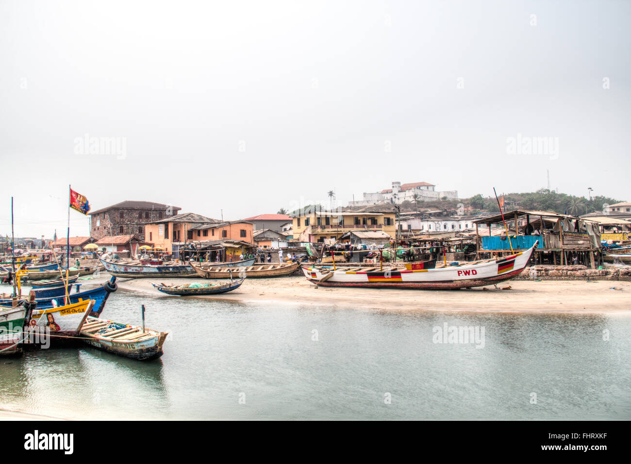 Boats in the port of Elmina near the castle at the coast of Ghana Stock ...