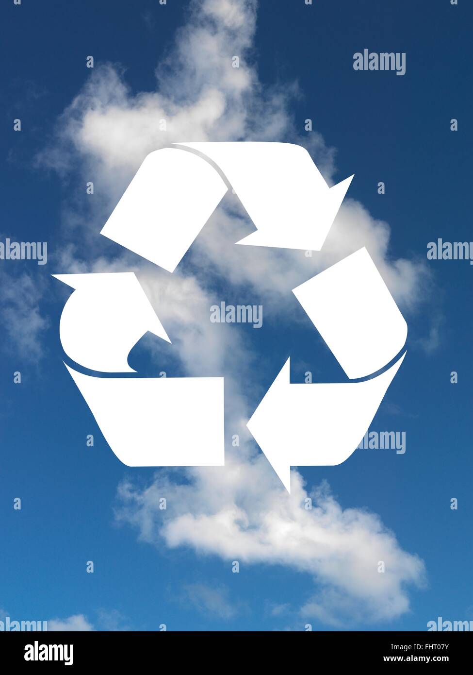 A recycle symbol cutout on a blue sky Stock Photo - Alamy