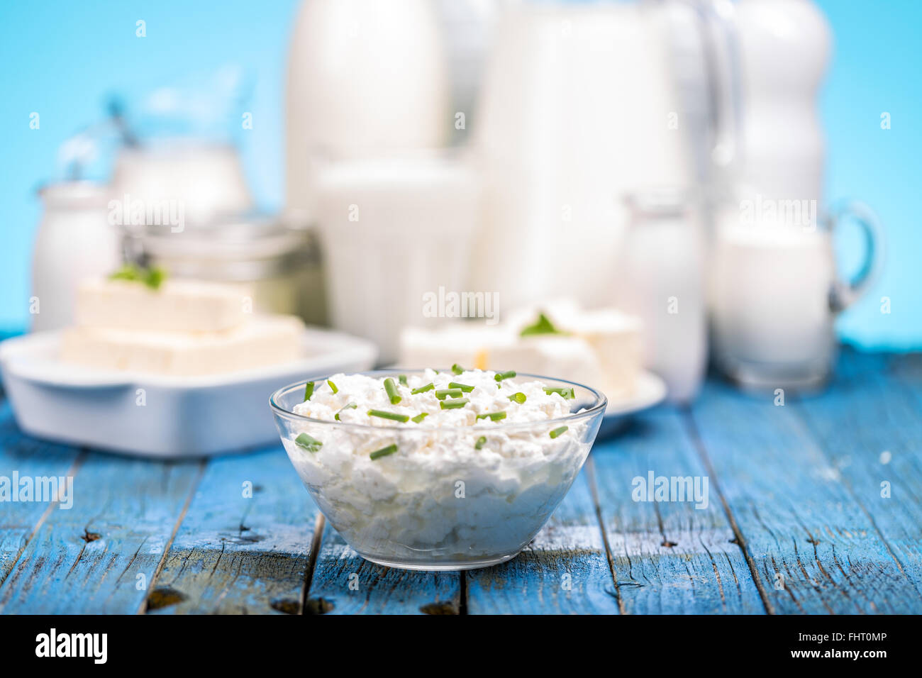 Cottage cheese with chives in glass bowl Stock Photo - Alamy