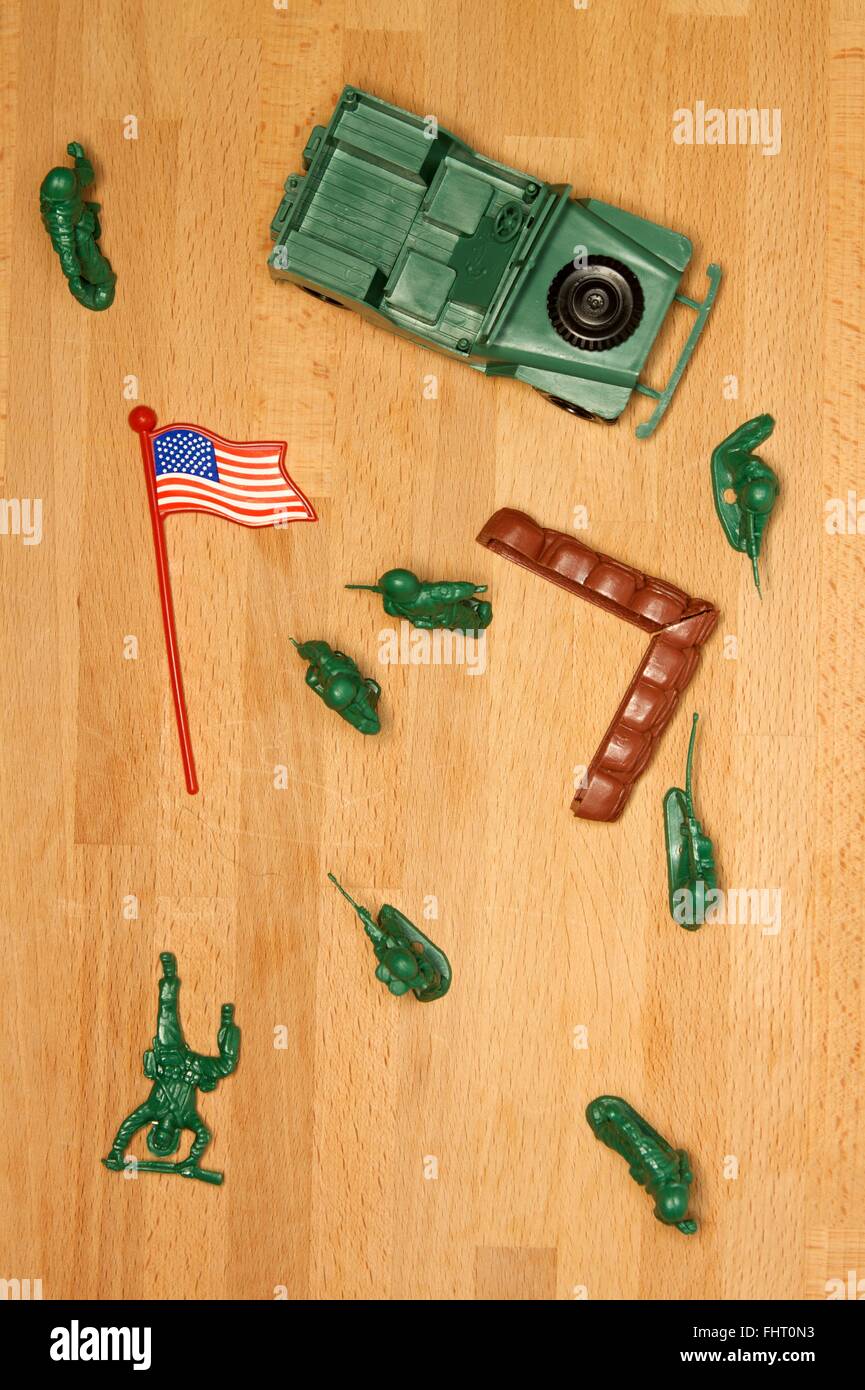 Aramy toy play figures on a wooden floor Stock Photo - Alamy